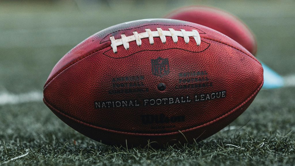 What Size Is a Football? High School, College, and NFL Dimensions ...