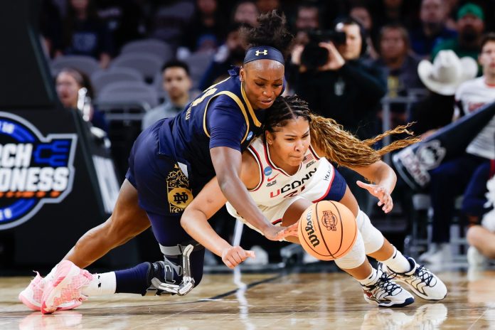 Sarah Strong's Mom Allison Feaster Celebrates Huskies' Elite Eight Win ...
